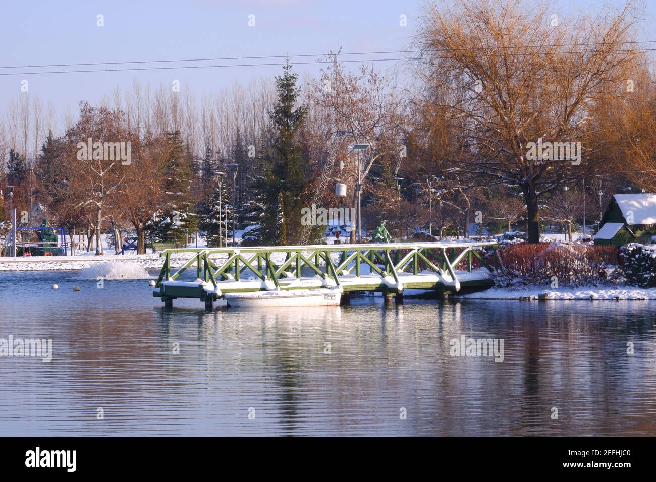 Very small lake in a forest in winter hi-res stock photography and ...