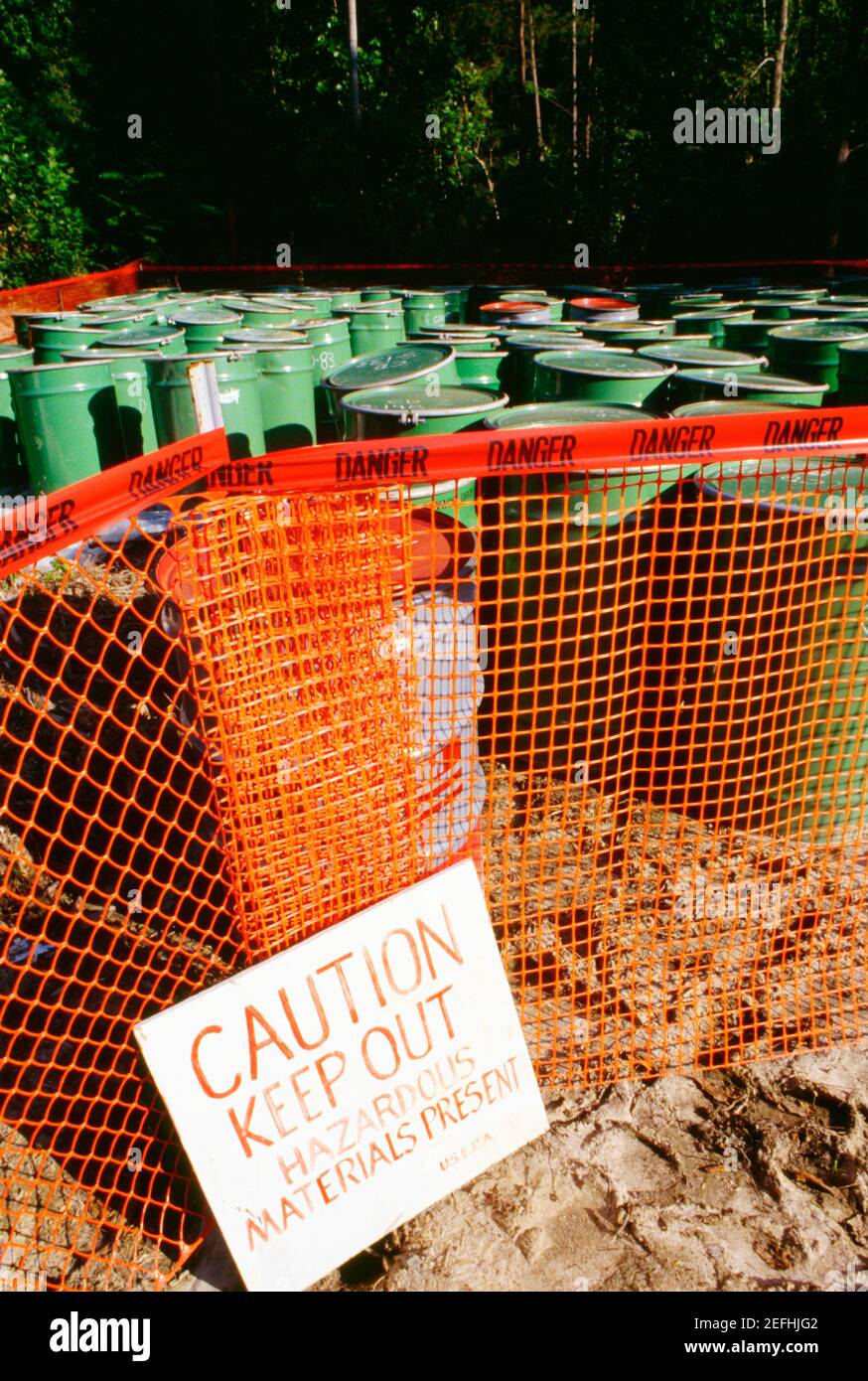 Warning sign in front of barrels of toxic waste, Virginia, USA Stock ...