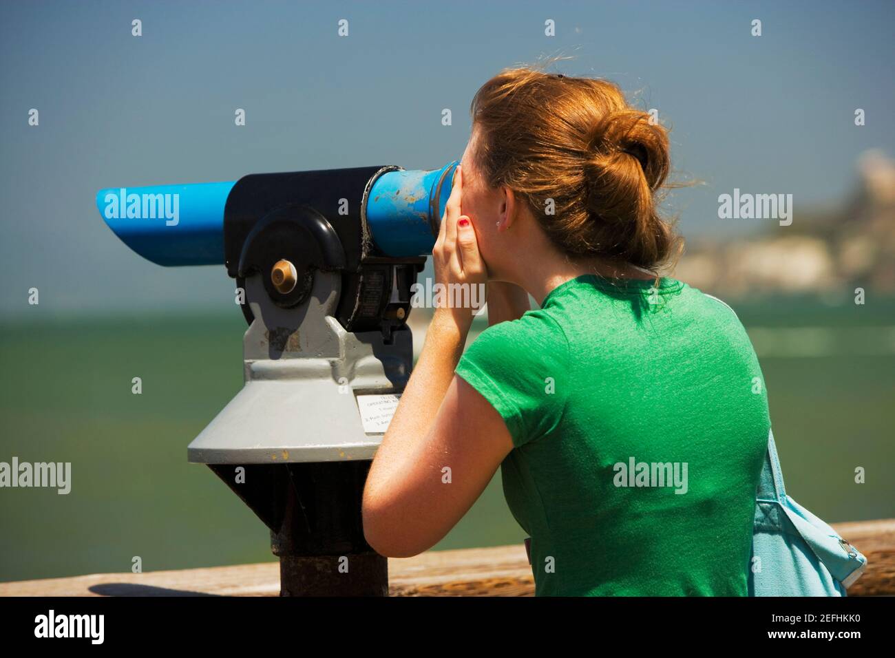 Waist up looking through an object hi-res stock photography and images ...