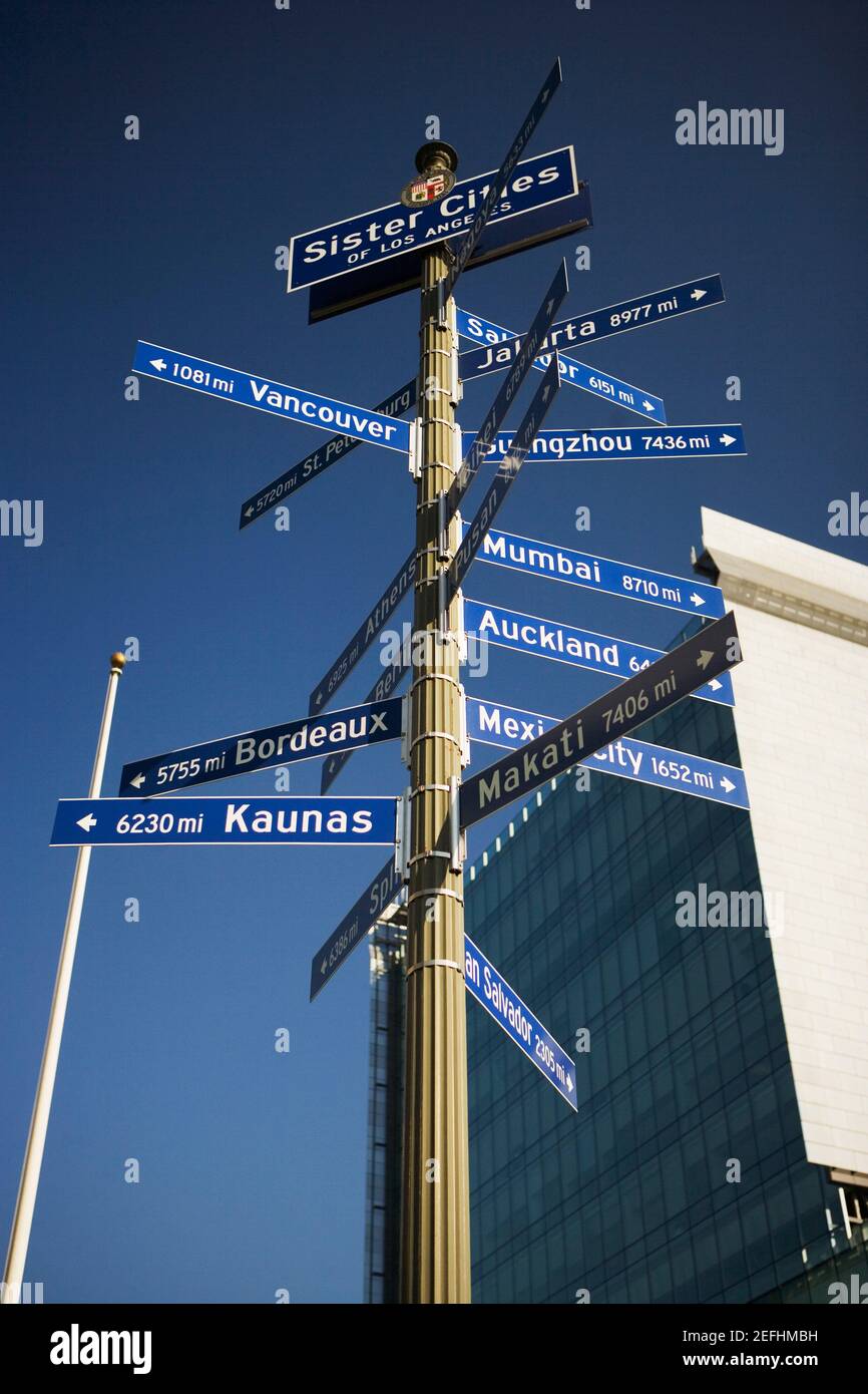 Low angle view of directional signs Stock Photo - Alamy