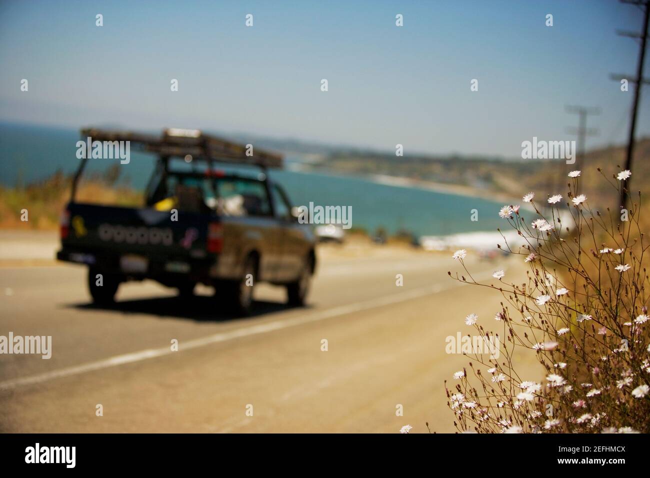 Rear view of a truck on a road Stock Photo - Alamy