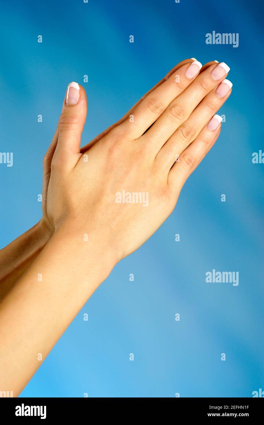 Clasped hands thumb hi-res stock photography and images - Alamy