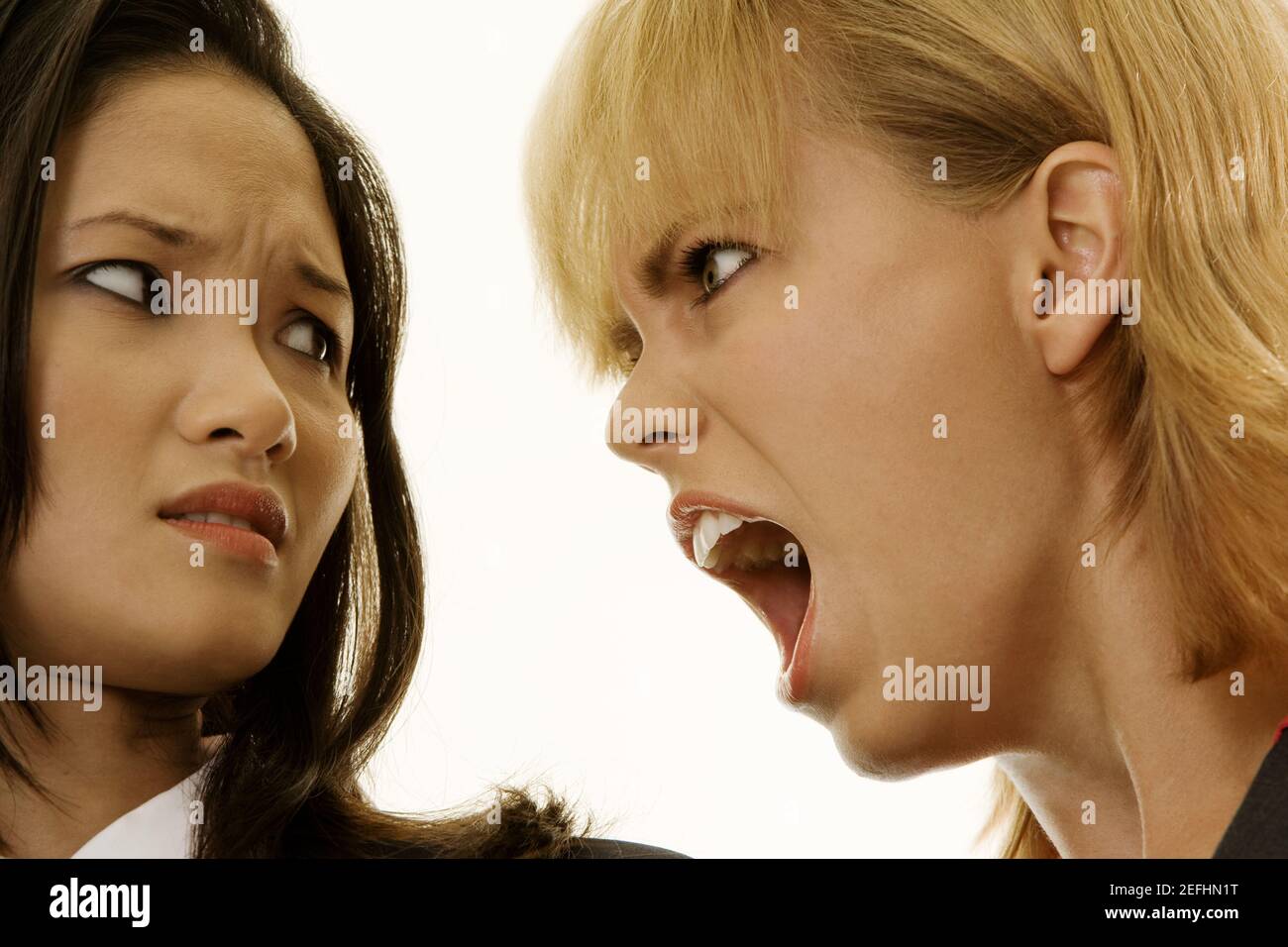 One woman yelling another hi-res stock photography and images - Alamy
