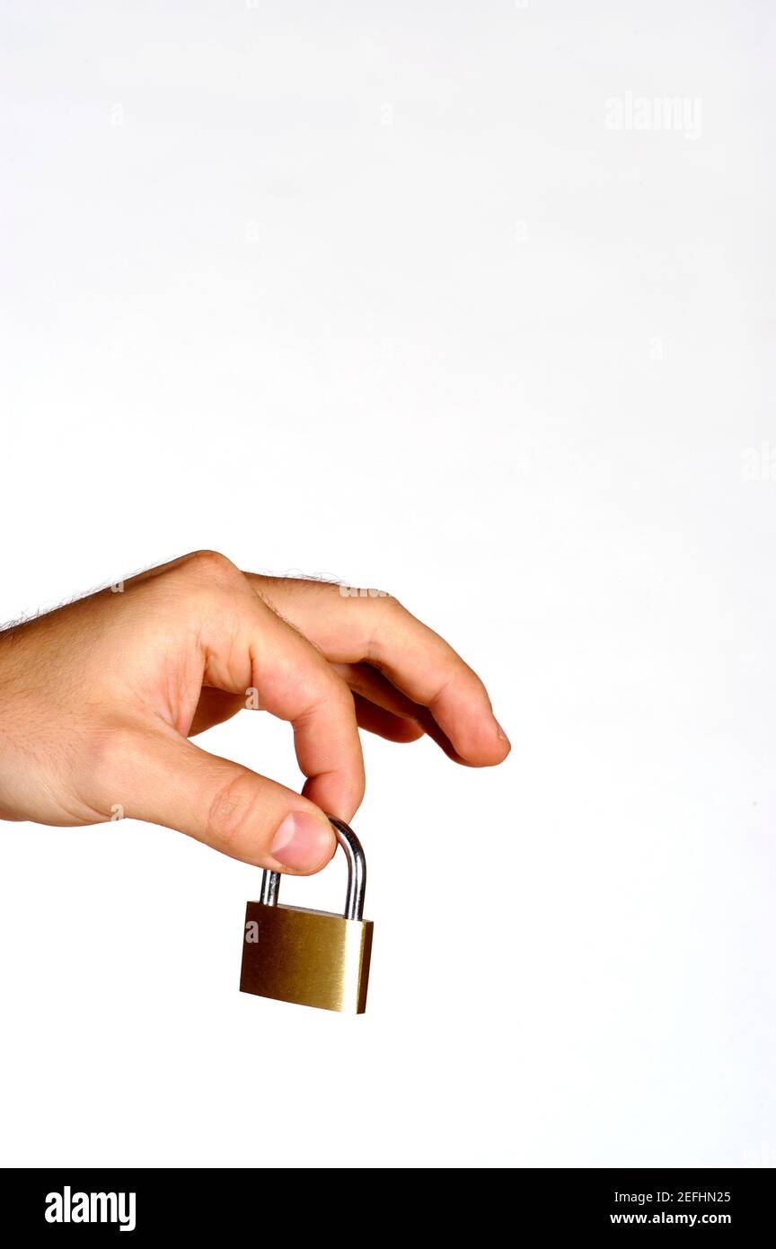 Hand Holding Padlock High Resolution Stock Photography and Images - Alamy