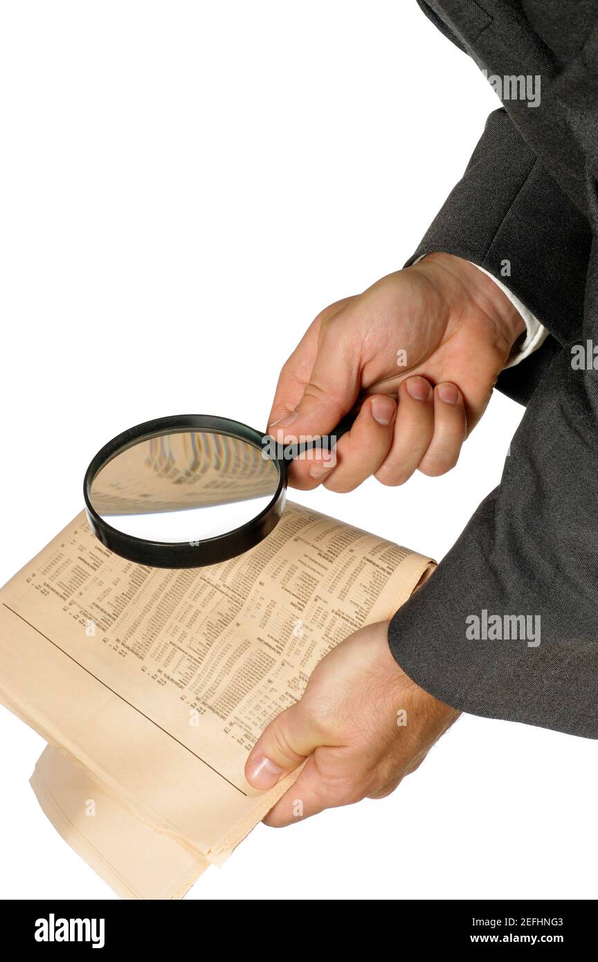 Magnifying glass reading adult hi-res stock photography and images - Alamy