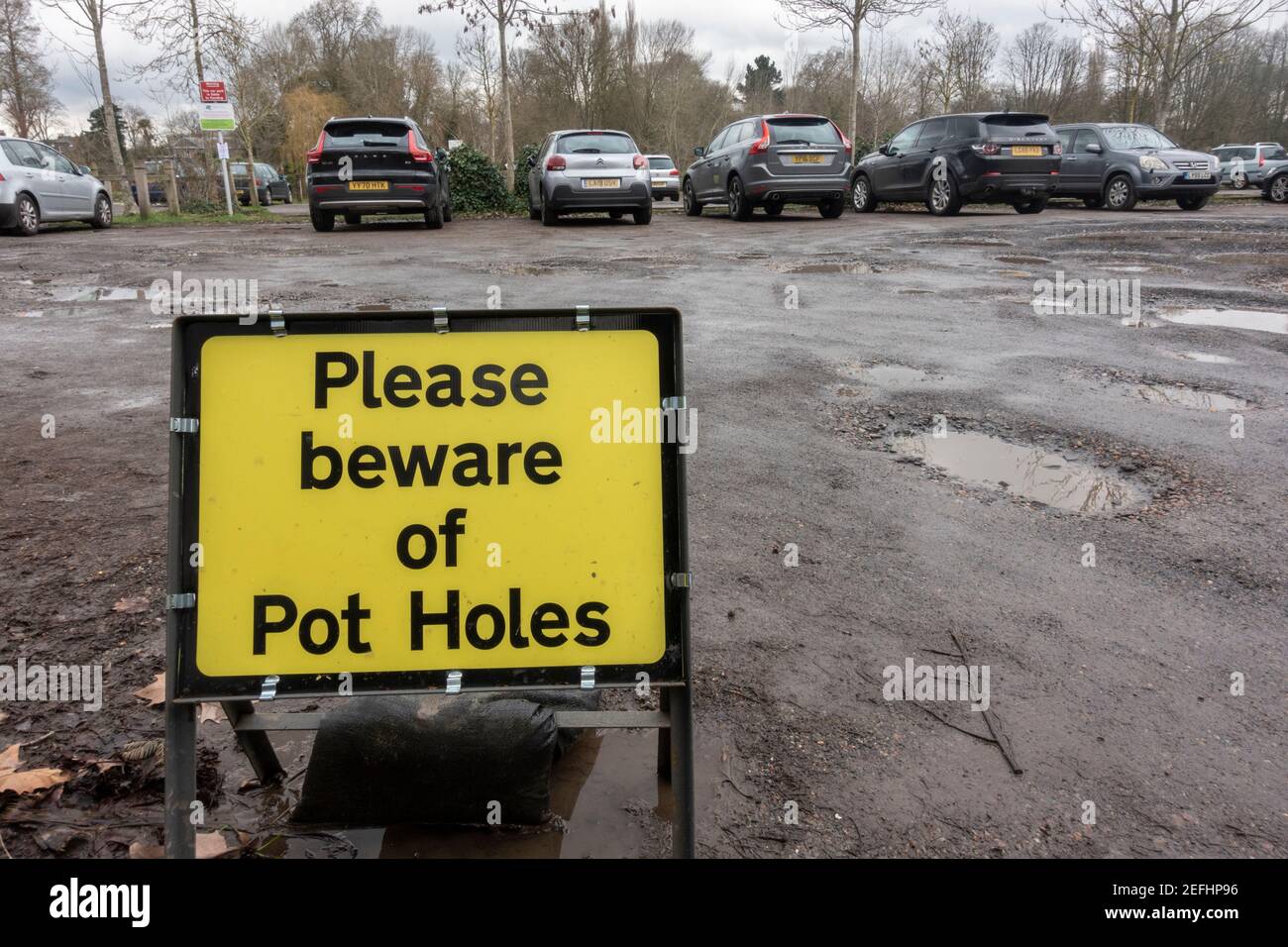 Sign warning drivers 'Please beware of Pot Holes' in the Ham Street car ...