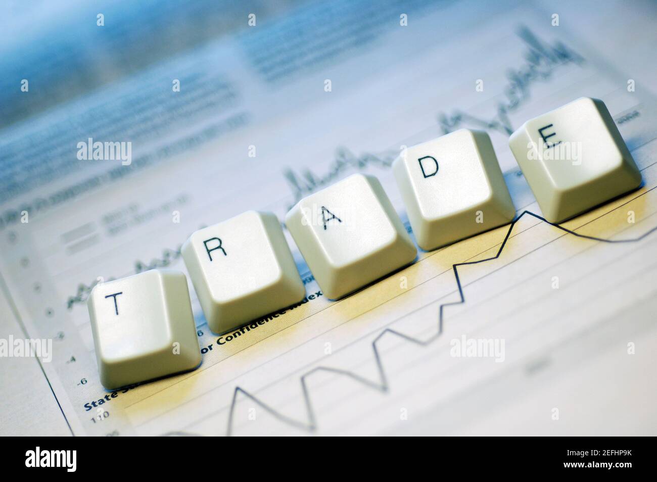 Close-up of computer keys on a line graph Stock Photo - Alamy
