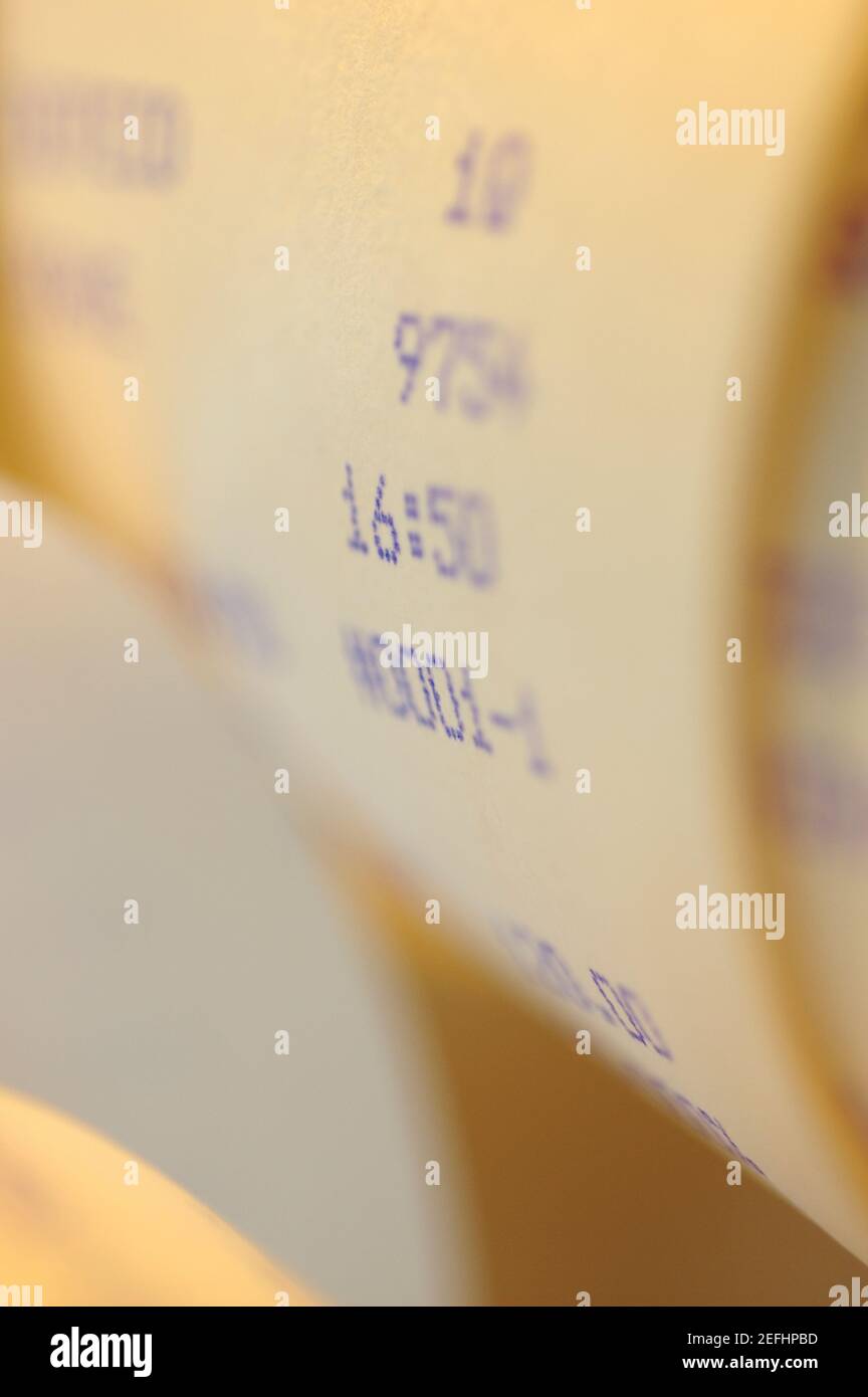 Close-up of numbers on a scroll receipt Stock Photo - Alamy
