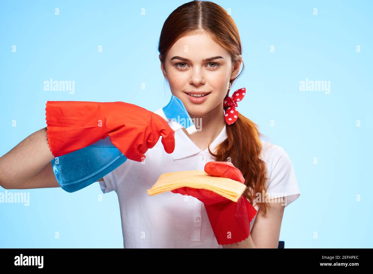 professional cleaning lady detergent with a rag in her hands working ...