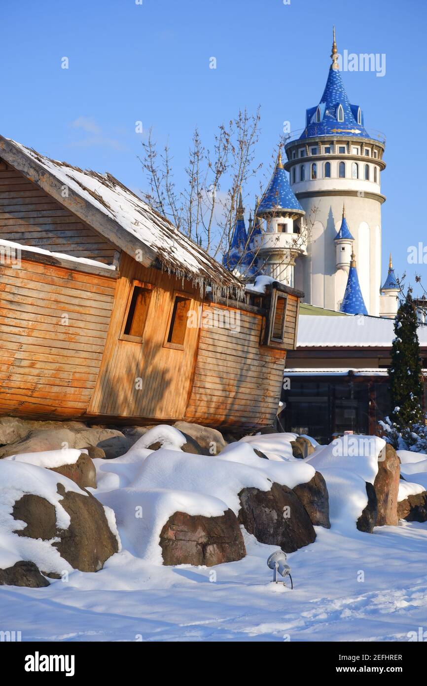 Blue Castle Towers and Small wooden Boat Stock Photo - Alamy