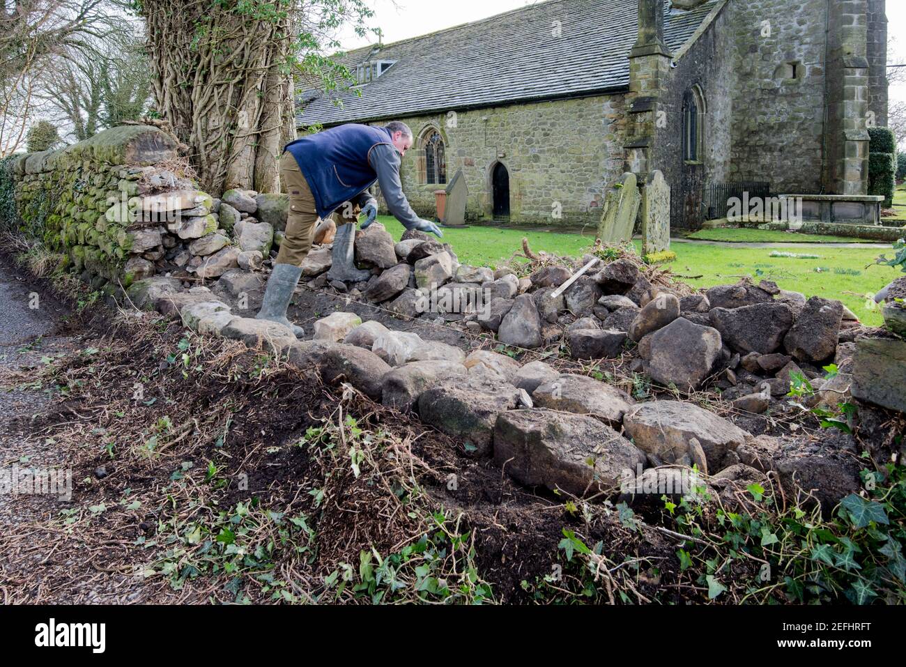 Drystone wall repair Stock Photo - Alamy