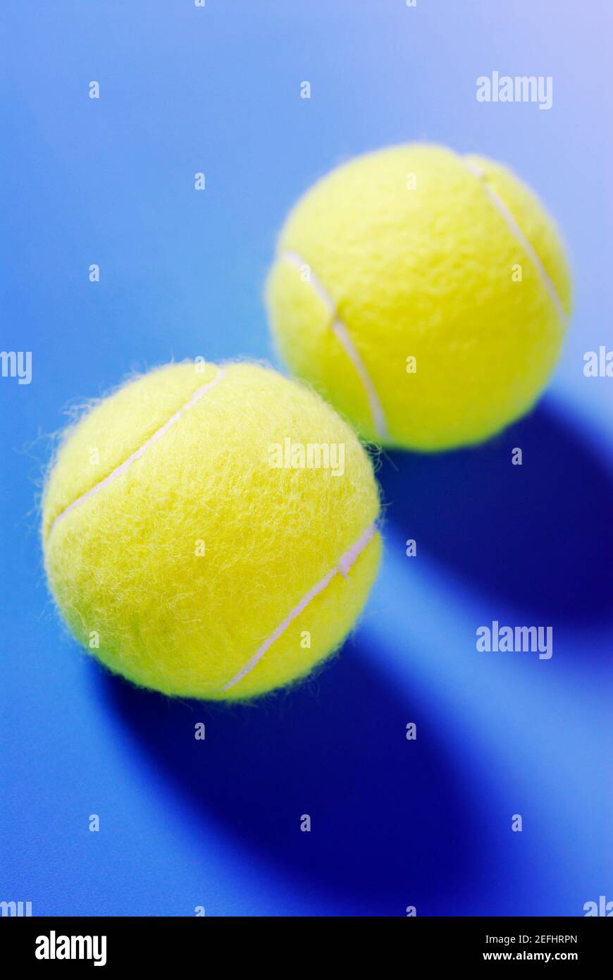 Two tennis balls hi-res stock photography and images - Alamy