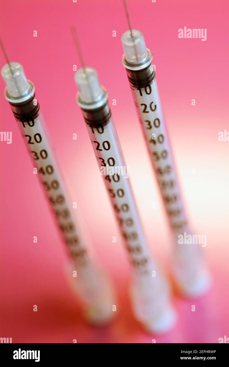 Close-up of three syringes Stock Photo - Alamy
