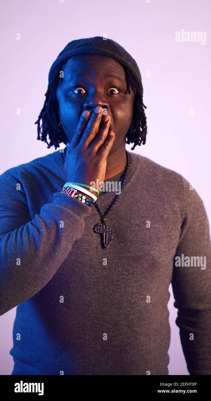Putting into mouth hi-res stock photography and images - Alamy