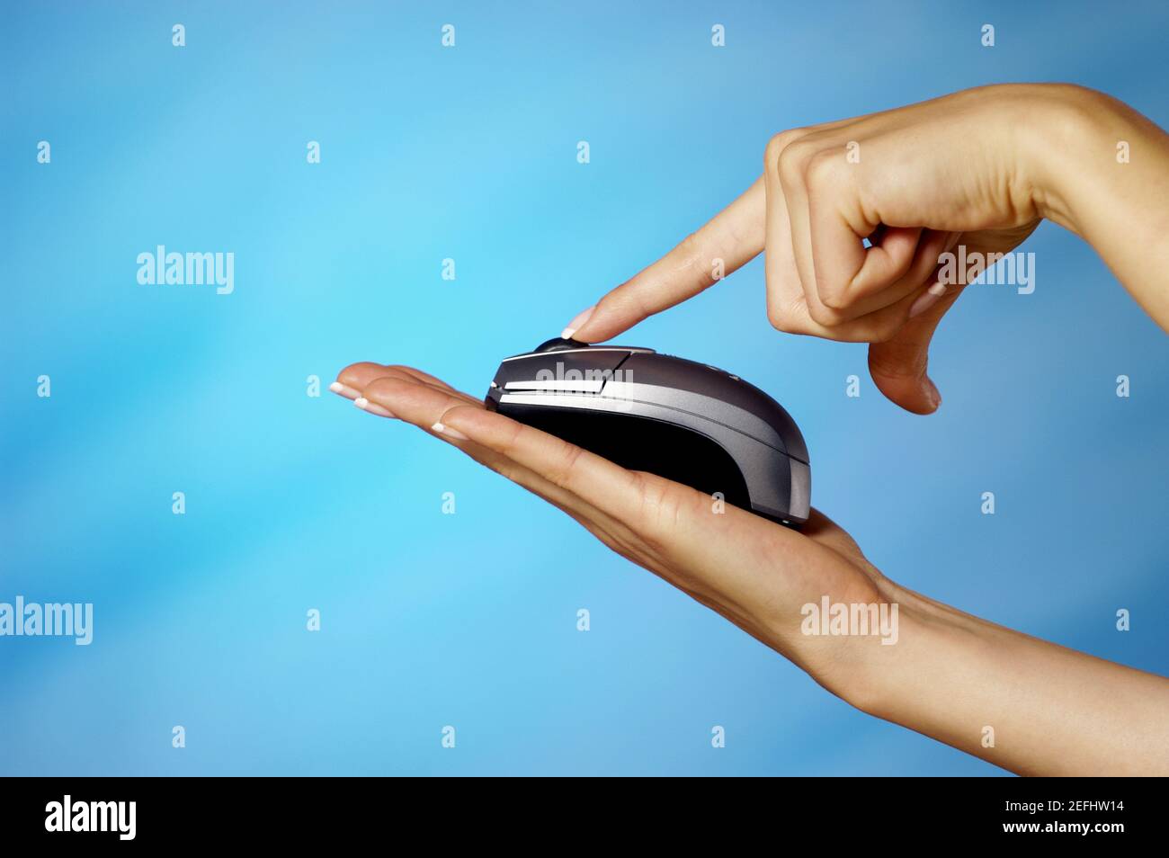 Woman pressing touch control hi-res stock photography and images - Alamy