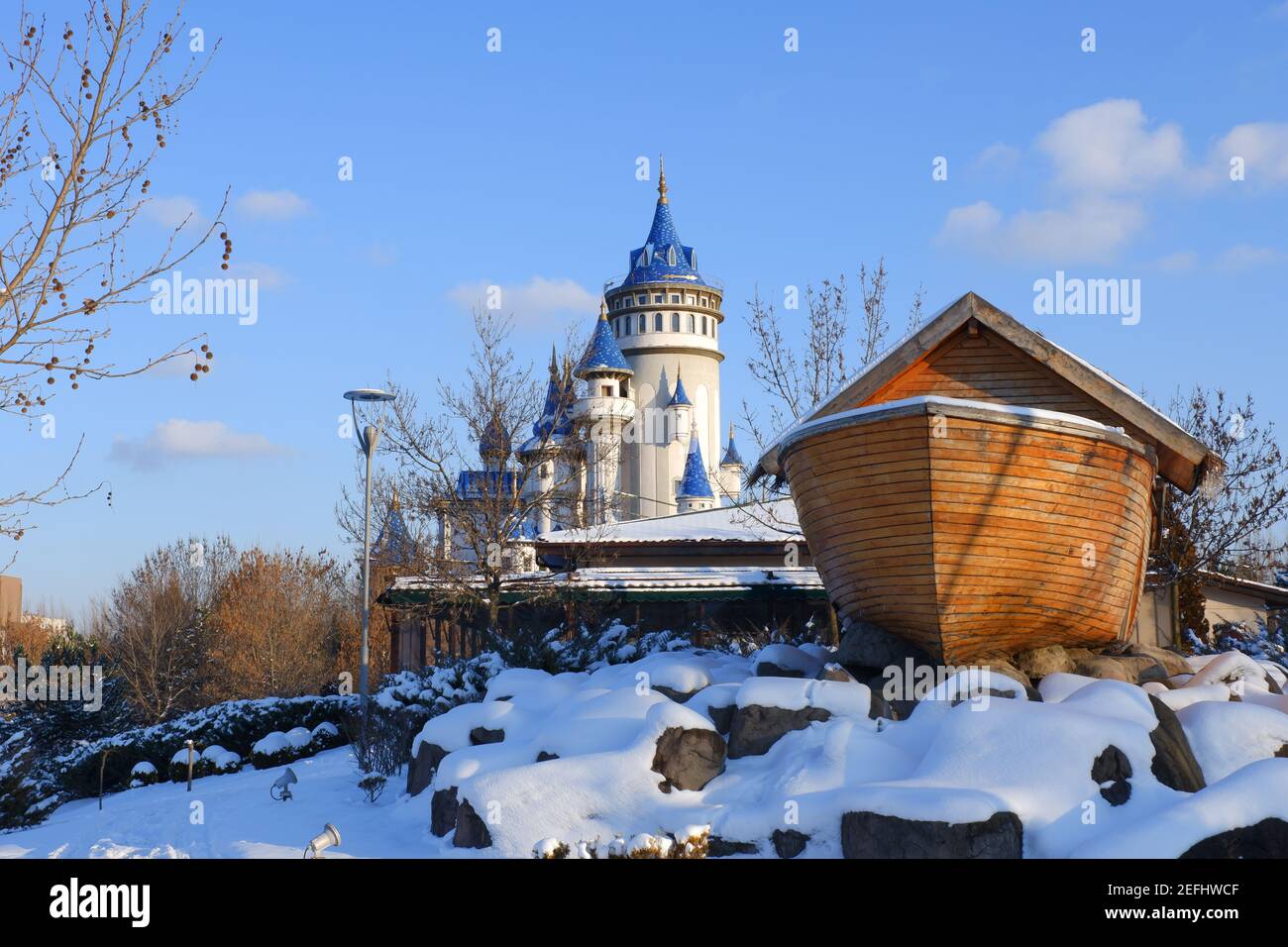 Small wooden boat and blue tale castle at the Background at Sazova Park ...