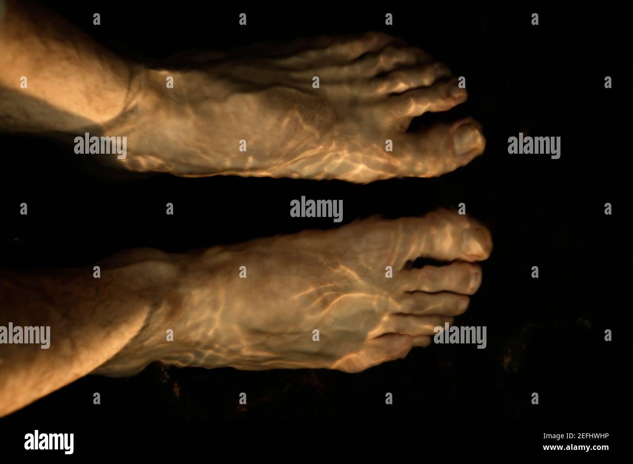 Legs underwater hi-res stock photography and images - Alamy