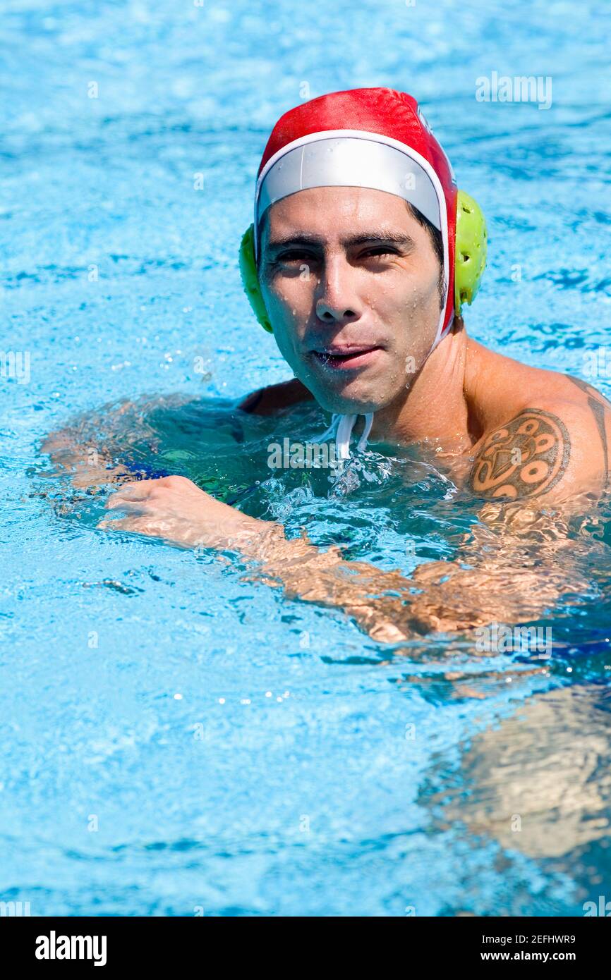Portrait of a mid adult man in a swimming pool Stock Photo - Alamy