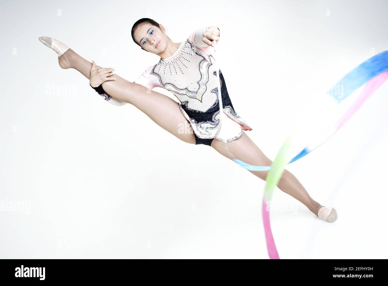 Female gymnast practicing with a ribbon Stock Photo - Alamy