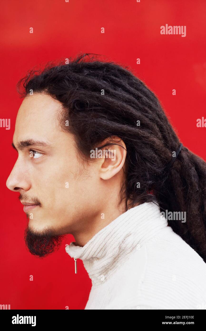 Side profile of a young man with dreadlocks Stock Photo - Alamy