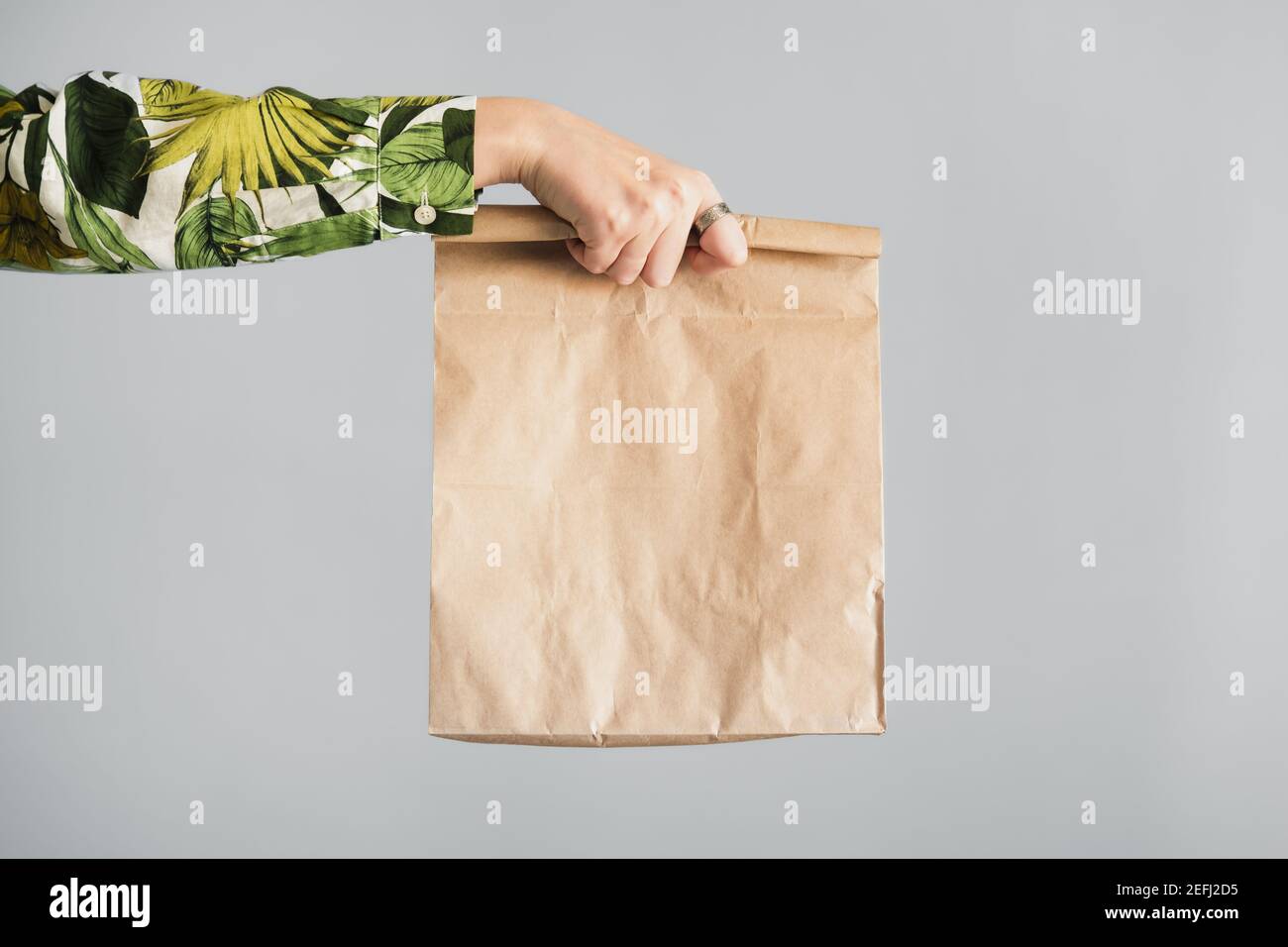 Handing paper hi-res stock photography and images - Alamy