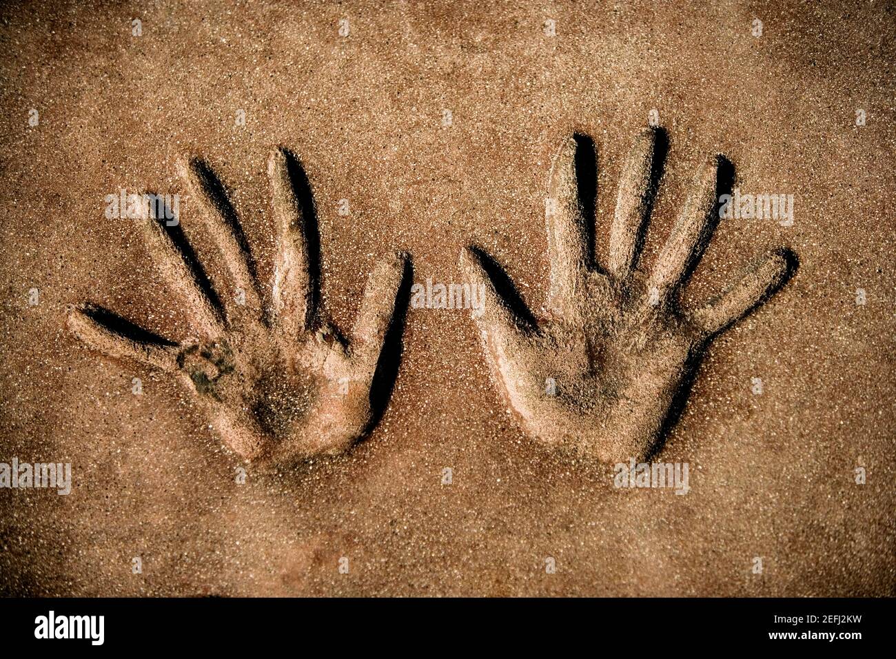 Cement handprints hi-res stock photography and images - Alamy