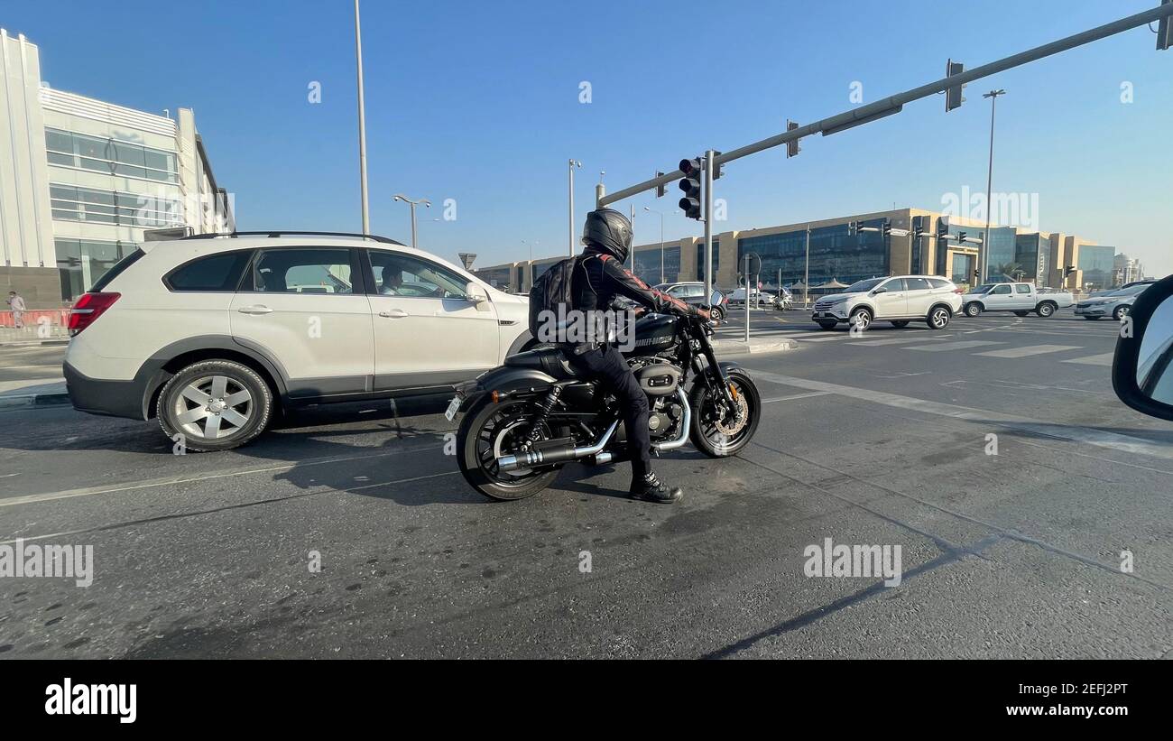Harley Division Biker standing on signal. bikes and traffic Stock Photo ...