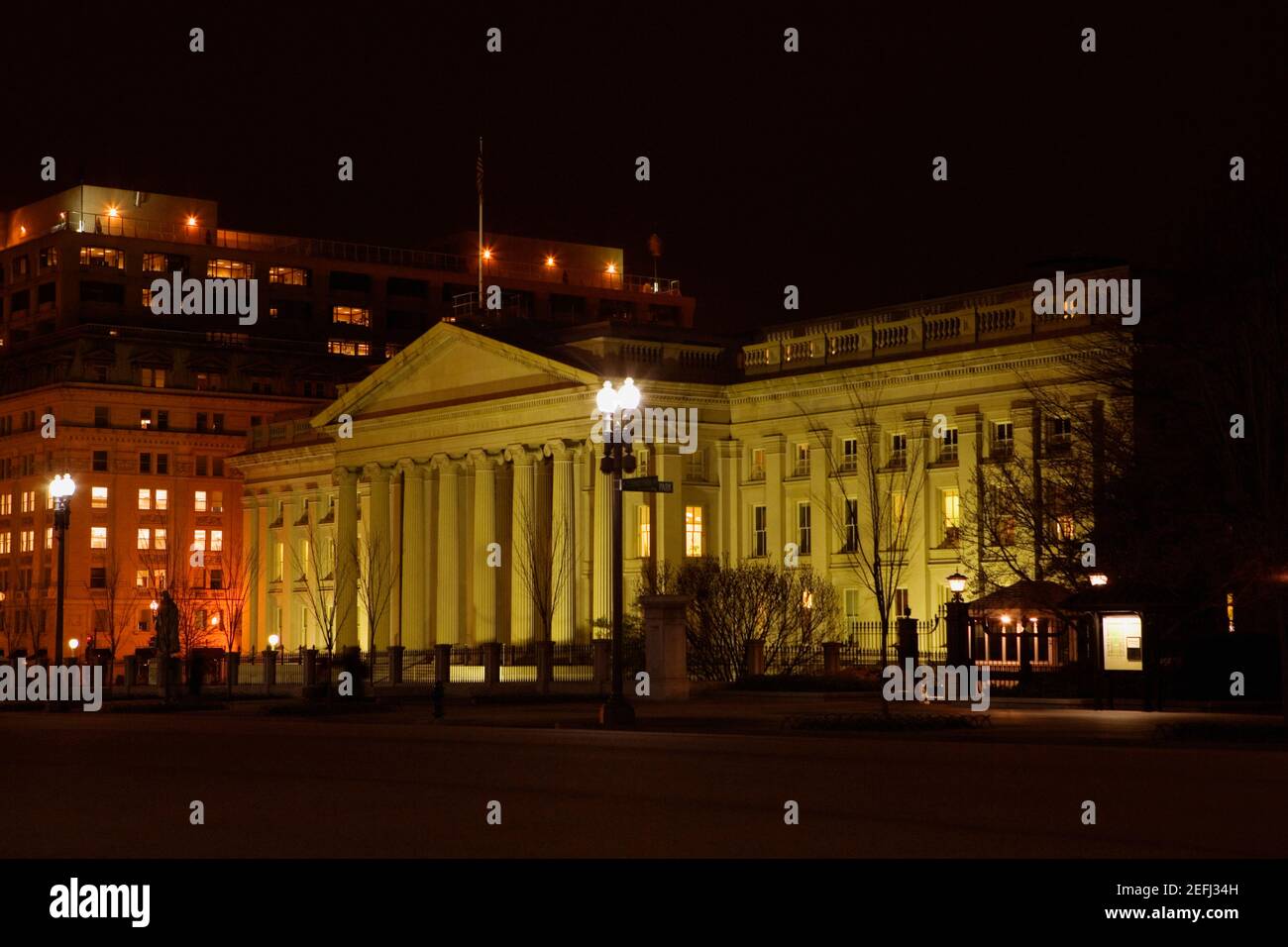 Facade of an art museum lit up at night, National Gallery of Art ...