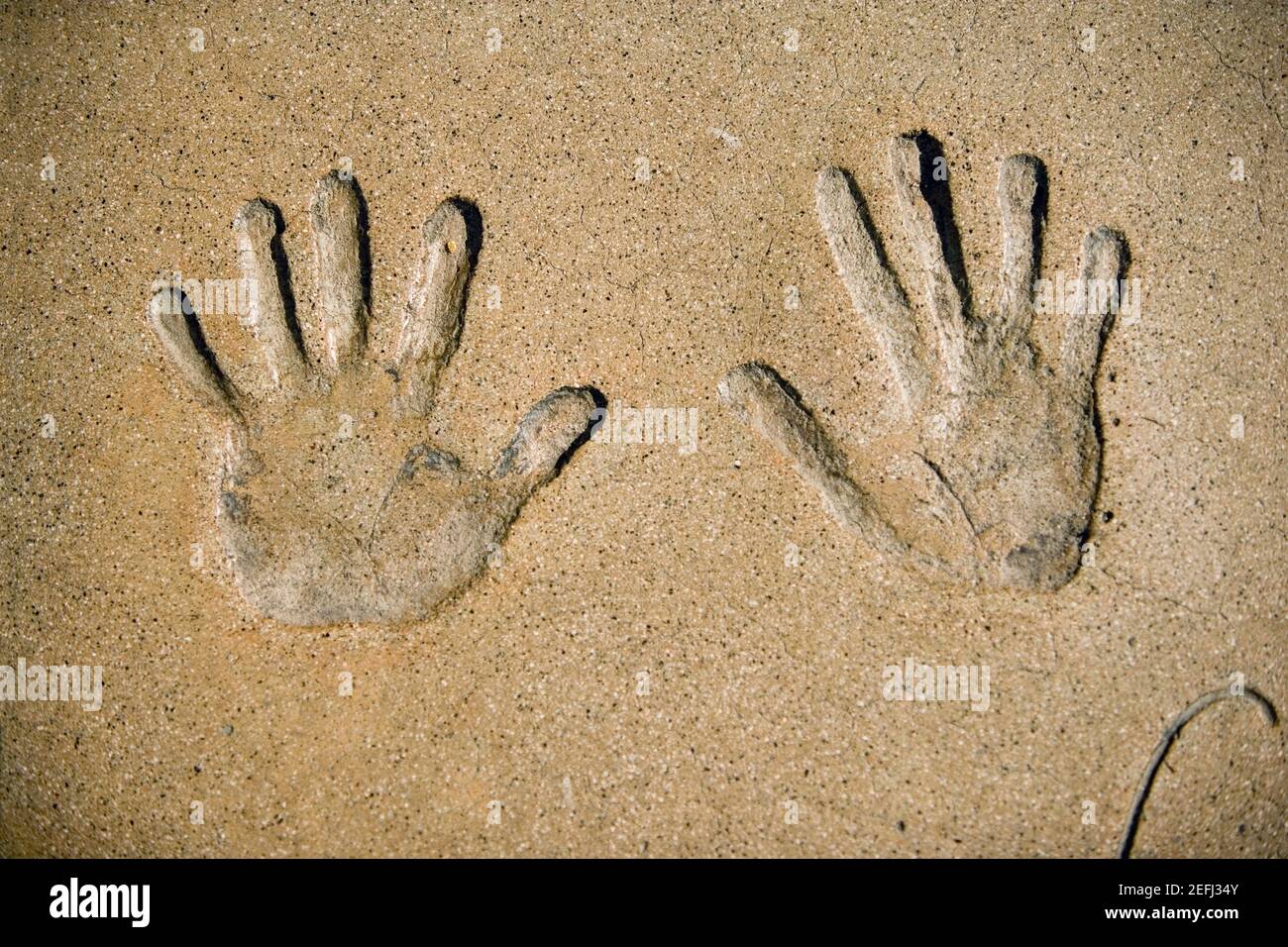Cement handprints hi-res stock photography and images - Alamy