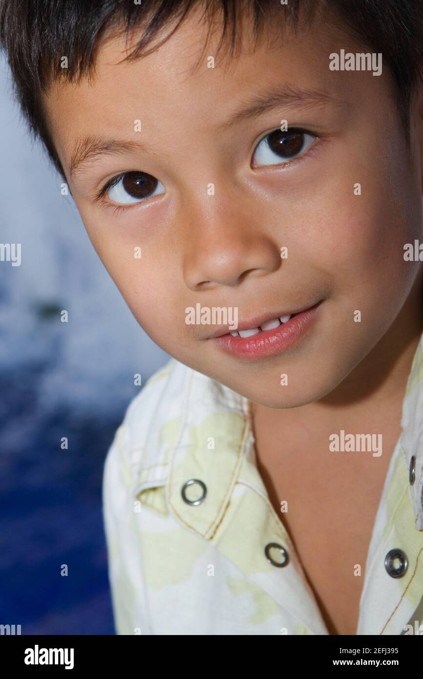 Portrait of a boy grinning Stock Photo - Alamy
