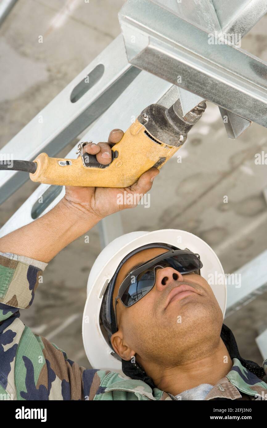 Male construction worker working hi-res stock photography and images ...