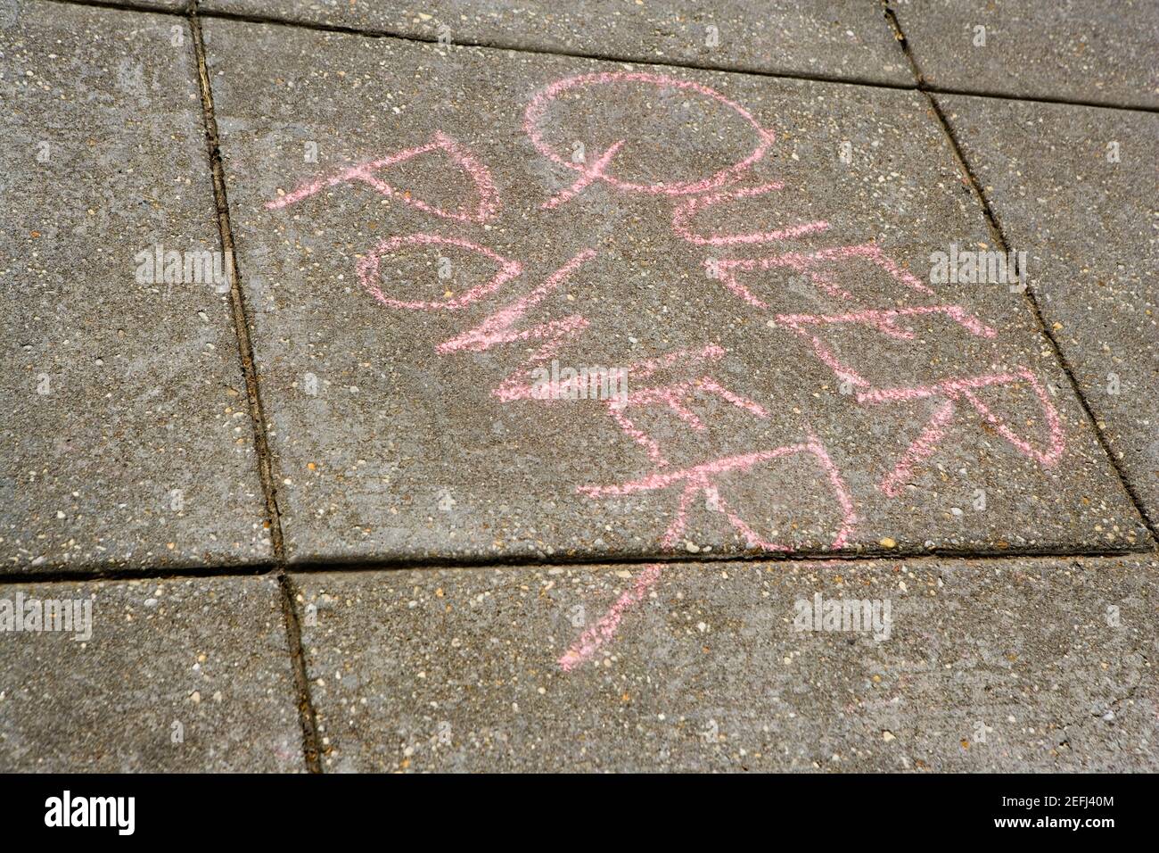 Text drawn on the road Stock Photo - Alamy