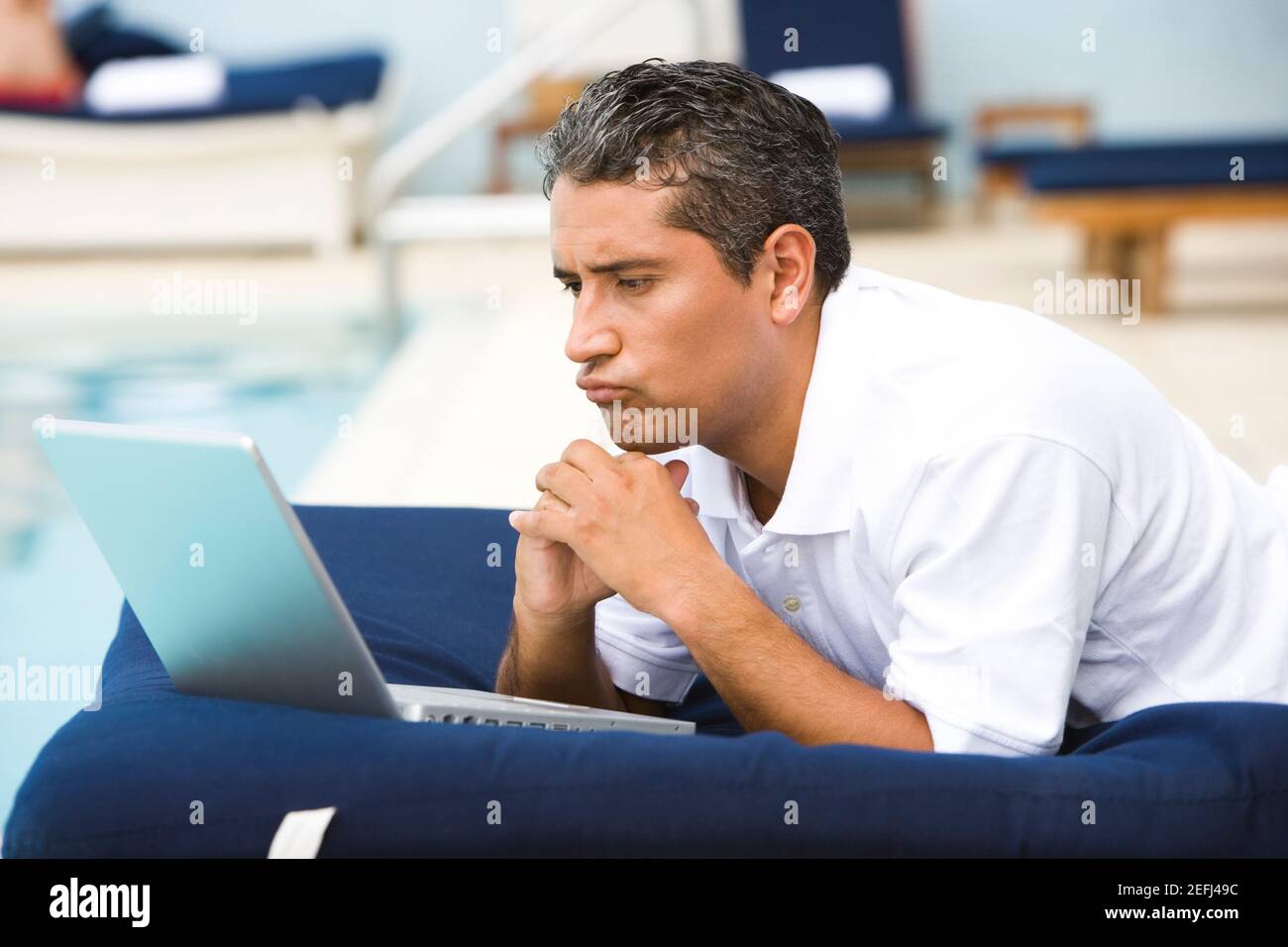 Middle aged black man using laptop hi-res stock photography and images ...