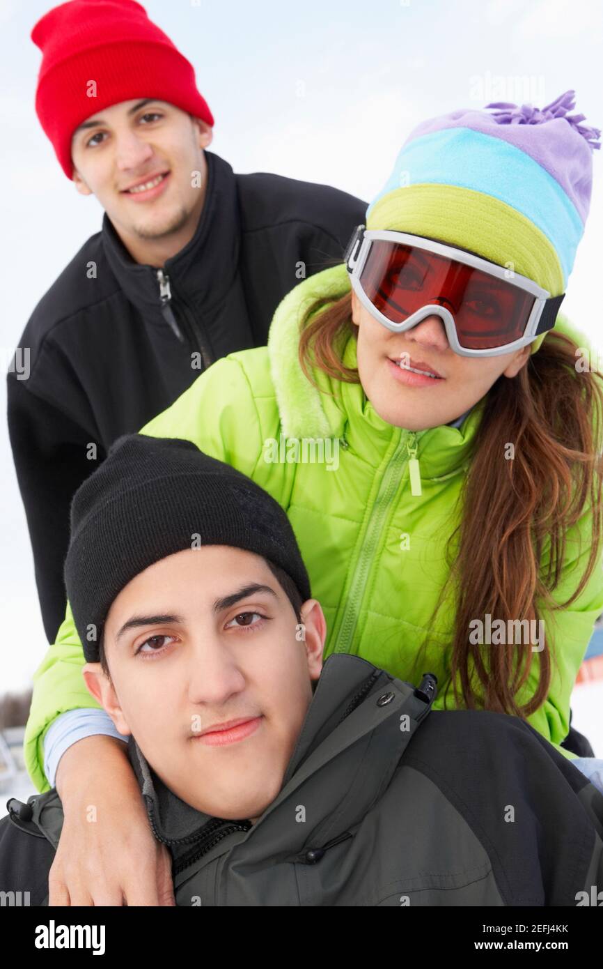 Three people smiling Stock Photo - Alamy