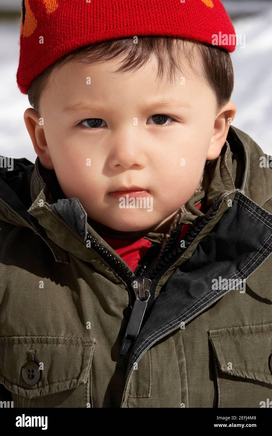 Child boy looking at camera staring hi-res stock photography and images ...