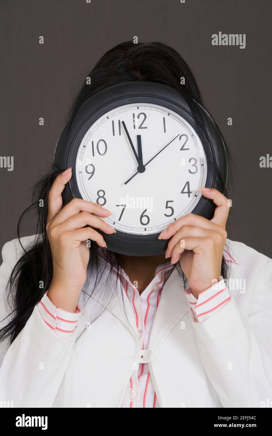 Woman clocking in to work hi-res stock photography and images - Alamy