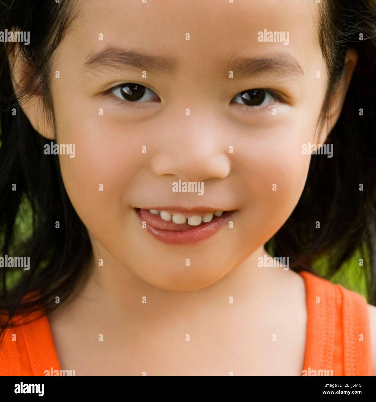 Portrait of a girl smiling Stock Photo - Alamy