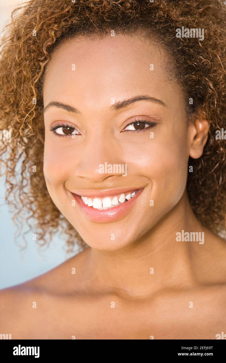 Medium portrait cheerful young latin hi-res stock photography and ...