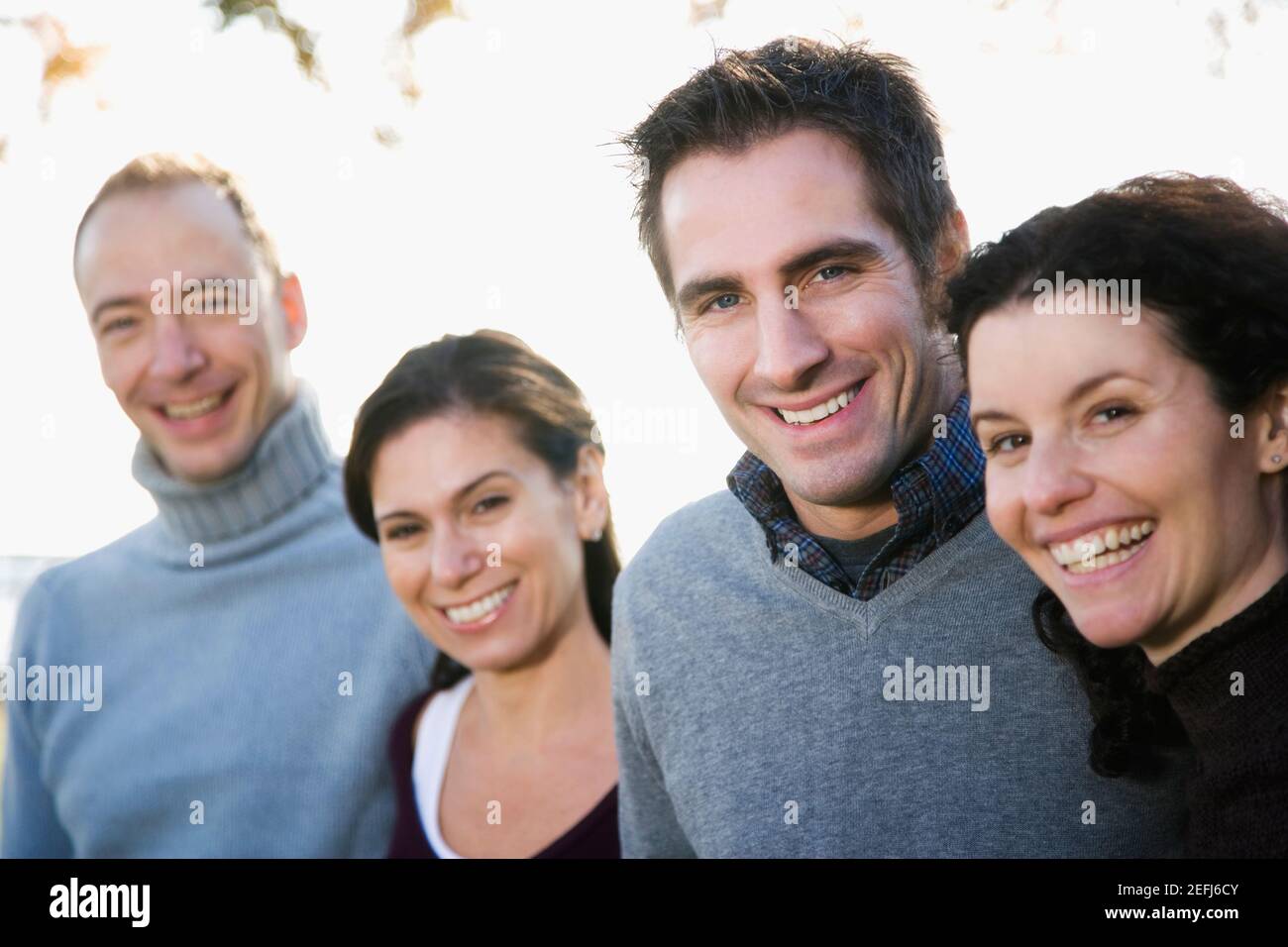 Portrait of two couples smiling Stock Photo - Alamy