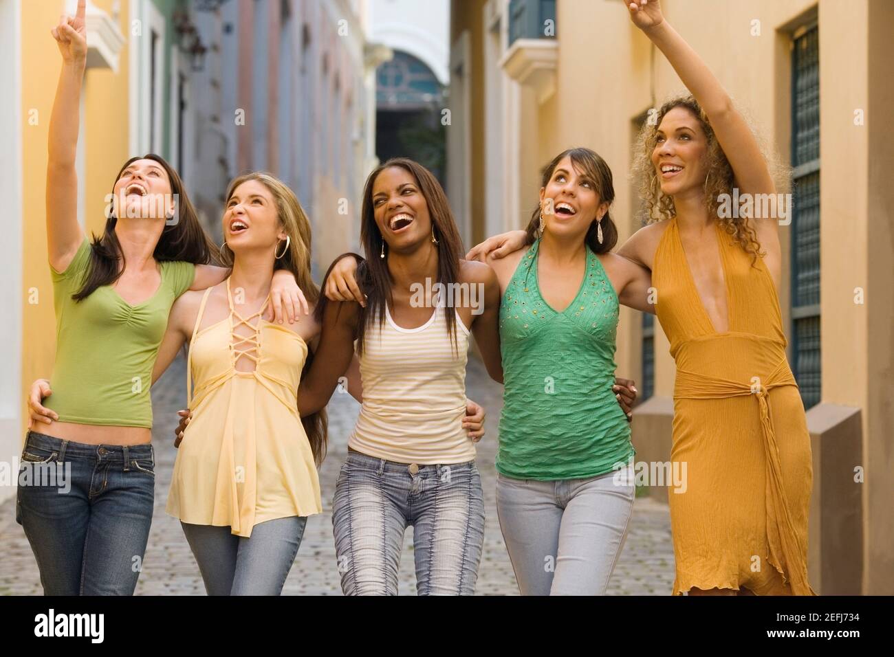 Five teenage girls with their arms around each other Stock Photo - Alamy