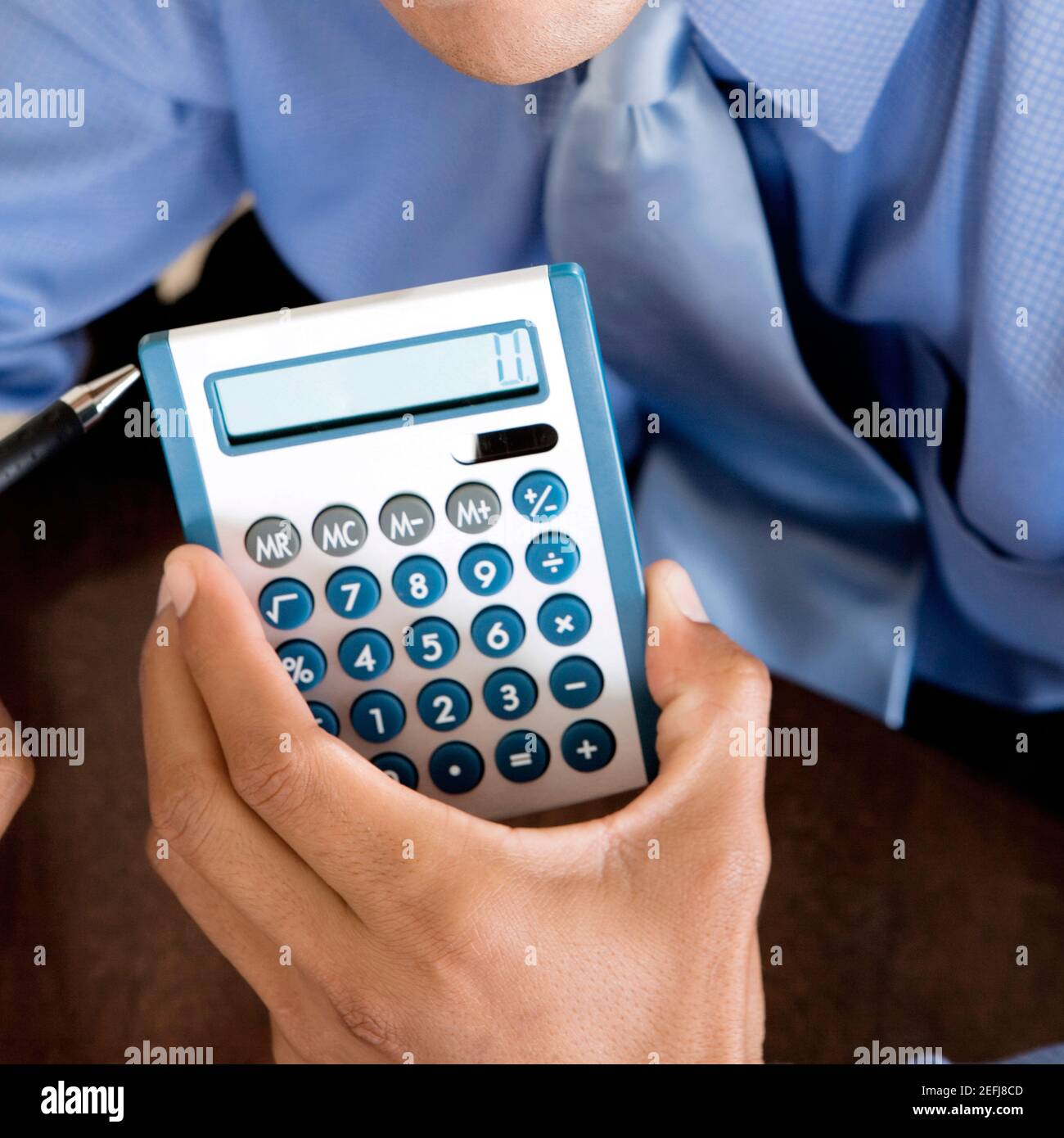 Holding accurate hi-res stock photography and images - Alamy