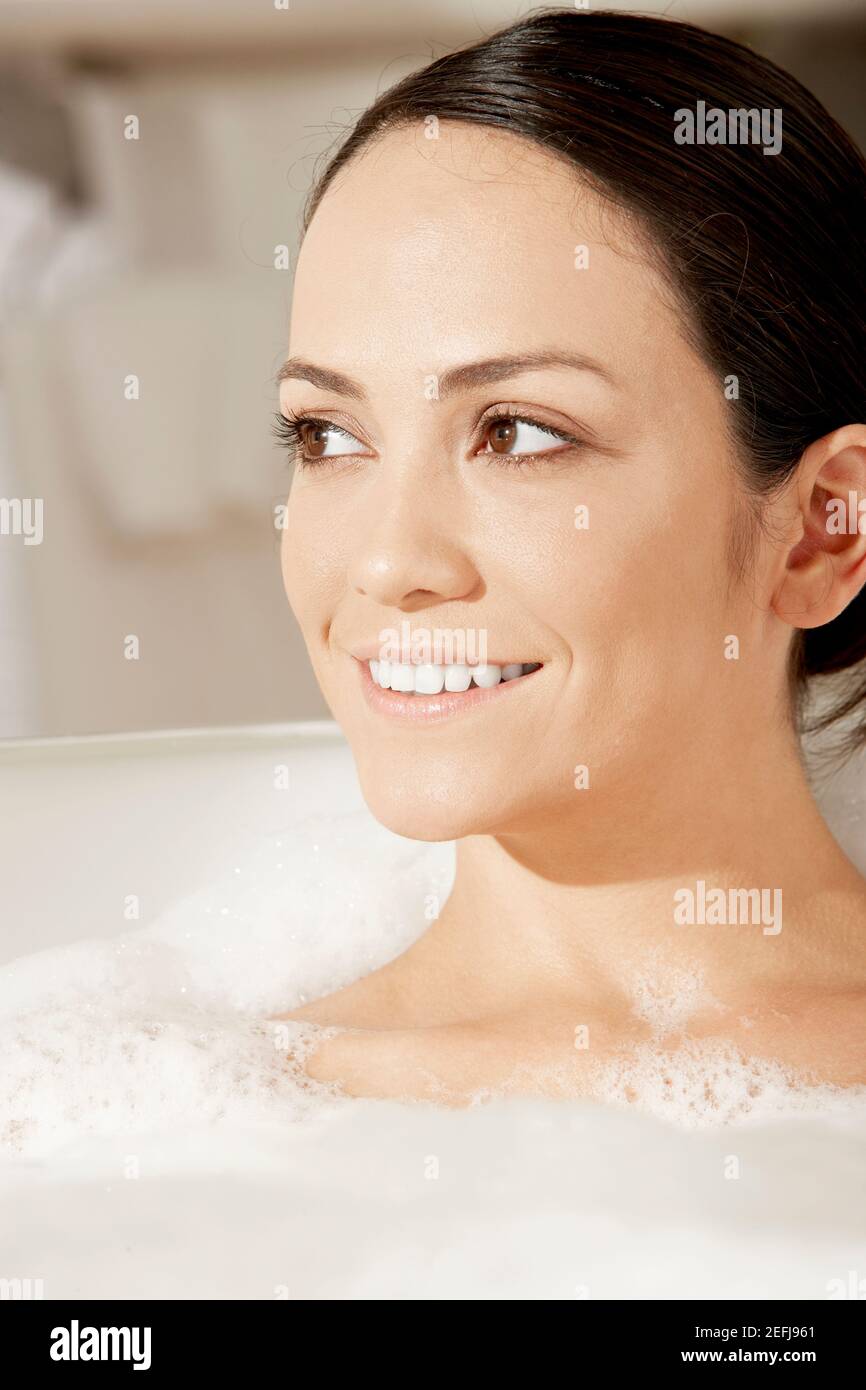 Woman in a bubble bath hi-res stock photography and images - Alamy
