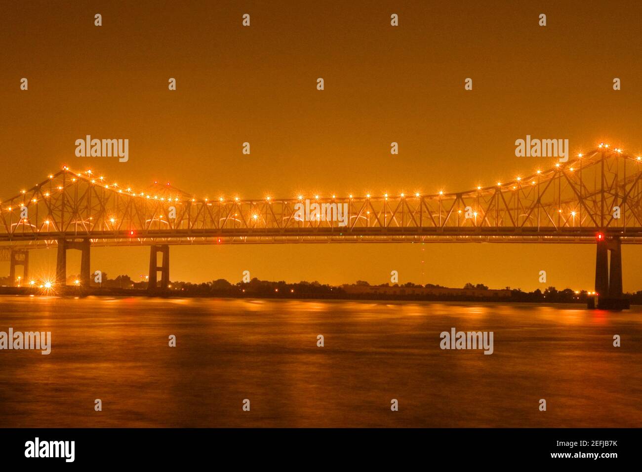 Bridge lit up at night, Mississippi River, New Orleans, Louisiana, USA ...