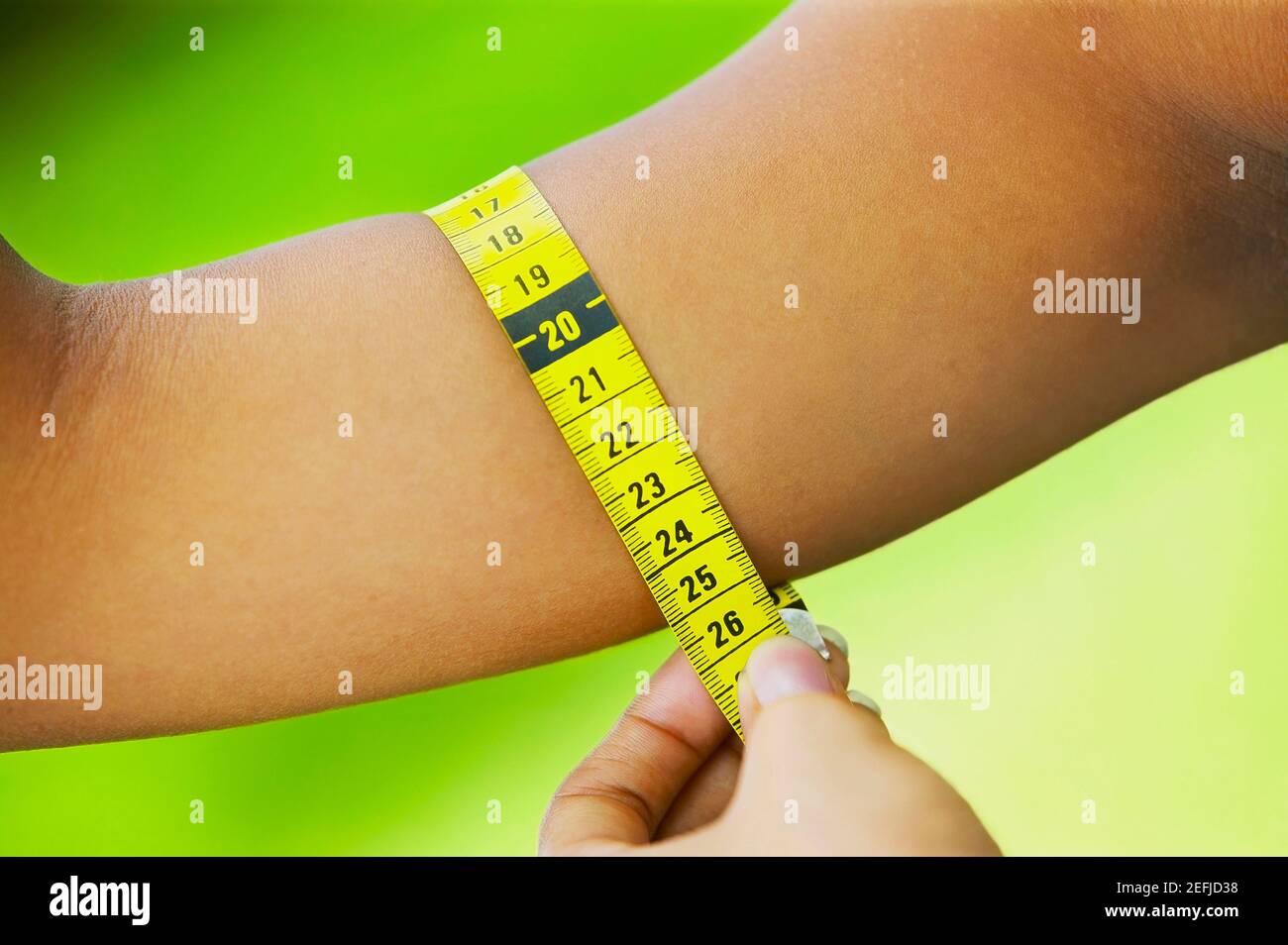 Measuring arm tape measure hi-res stock photography and images - Alamy