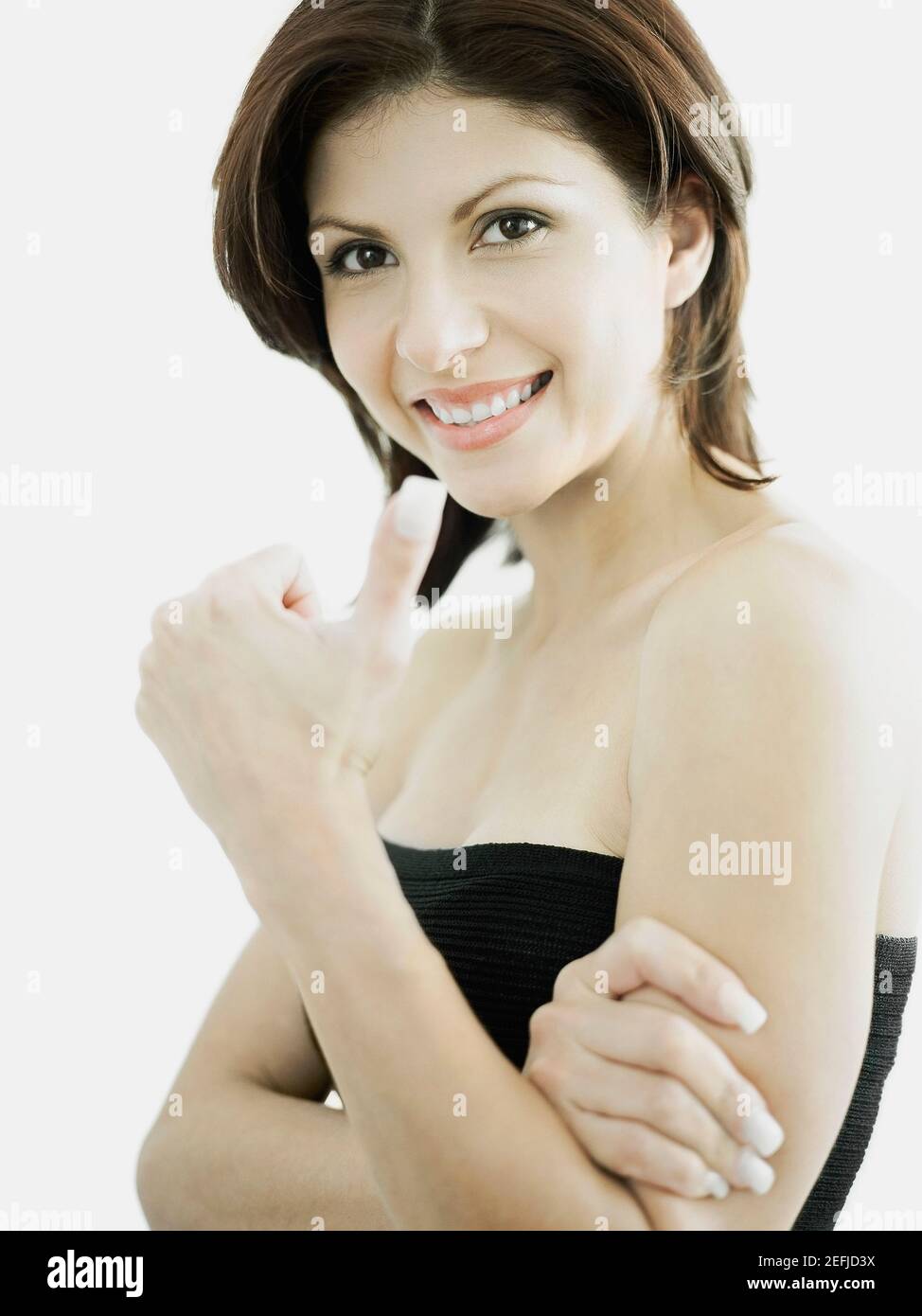 Portrait of a young woman giving thumbs up Stock Photo - Alamy Portrait of a young woman giving thumbs up Stock Photo - Alamy