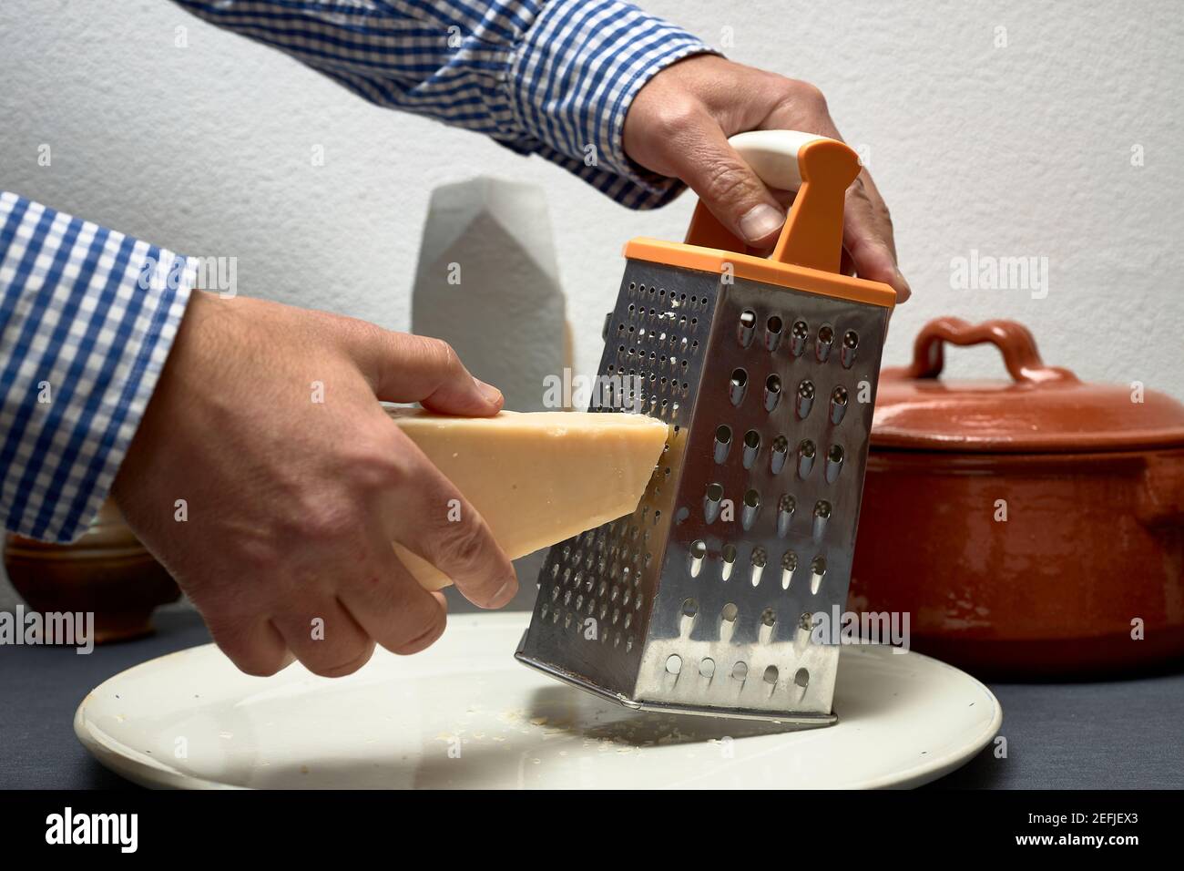 Grating cheese hi-res stock photography and images - Alamy
