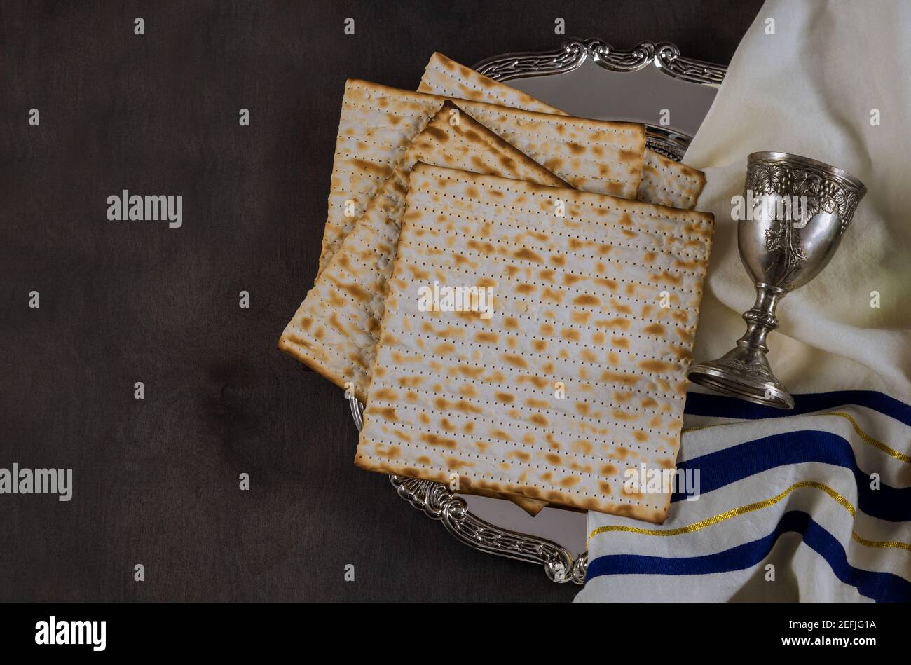 Pesach Jewish traditional celebration with cup wine kosher matzah on ...