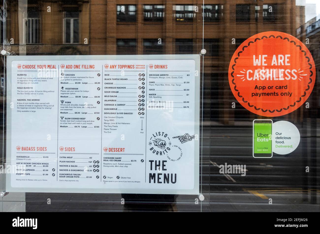Takeaway menu in the window of Listo Burrito, a small Mexican food ...