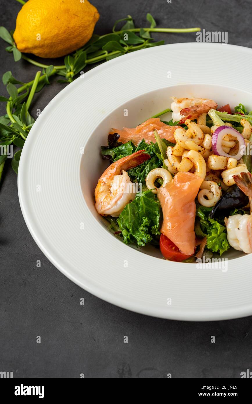 Cold Seafood Salad with Shrimp, Tuna and Octopus Stock Photo - Alamy