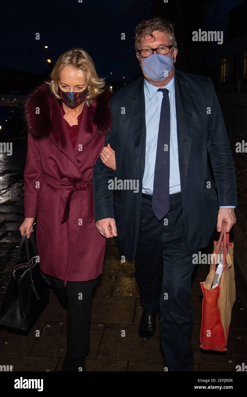 Hedge fund manager Crispin Odey, next to his wife Nichola Pease exits ...